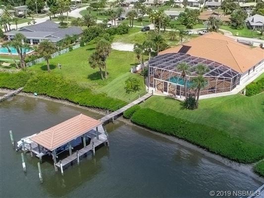 STUNNING HOME WITH DEEP WATER DOCK AND BOAT LIFT | Florida Luxury Homes ...